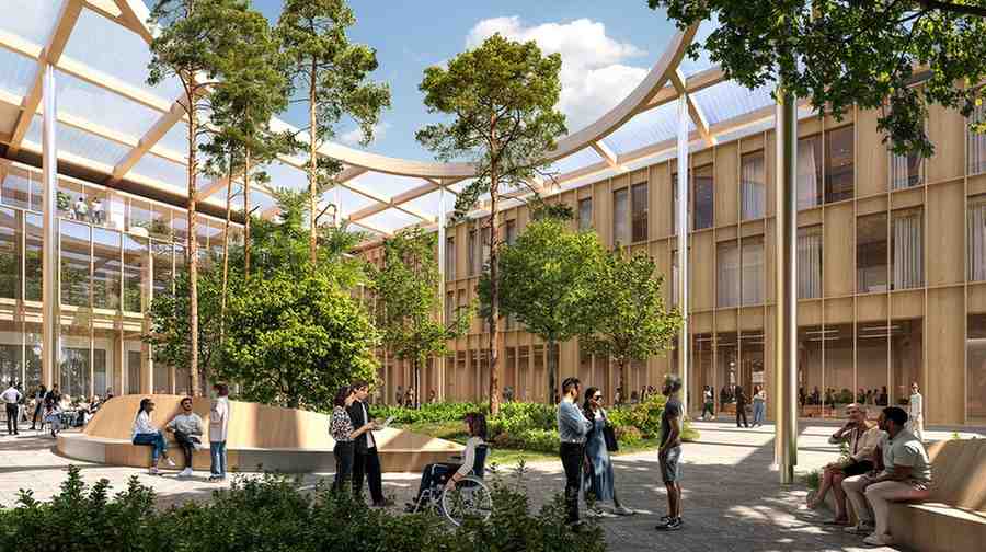 A courtyard showcases an innovative hospital design with a wooden ...